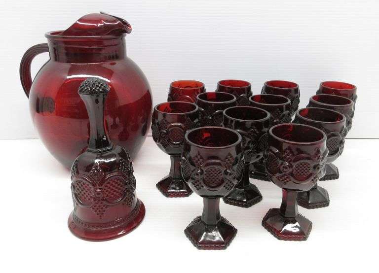 Ruby red pitcher, 8"H; (12) Avon ruby red goblets; Avon ruby red dinner ...