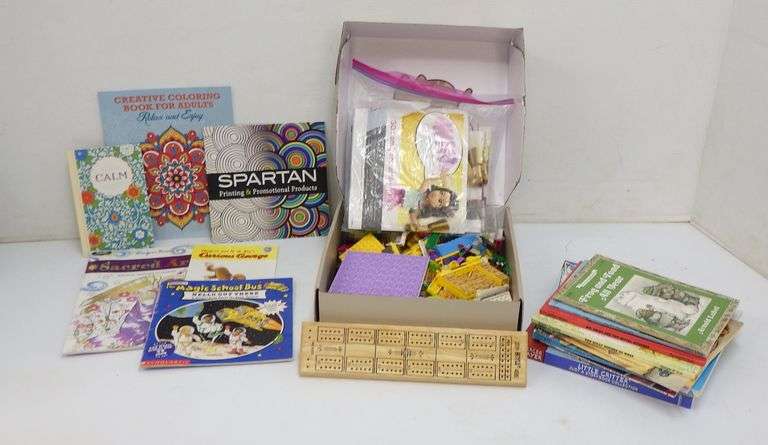 Multiple sets of Legos with directions; Cribbage board; Collection of ...