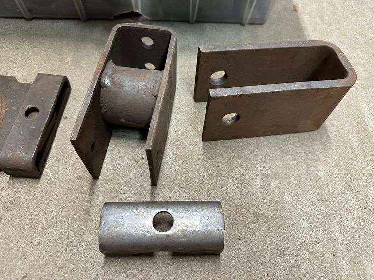 Various trailer spring hanger brackets and axle saddles, includes ...