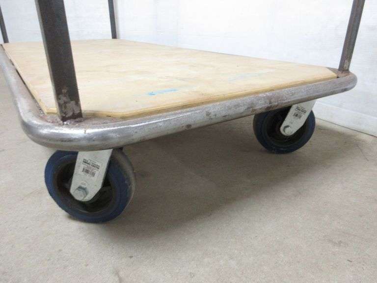 Large rolling cart with four swivel casters, metal frame, 62"W x 24"D ...