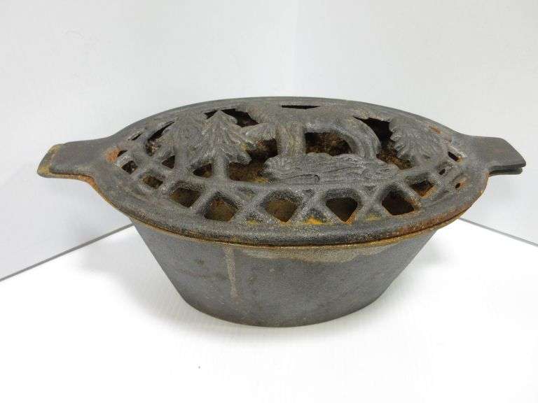 Oval cast iron wood stove humidifier/steamer with wolf design on lid ...