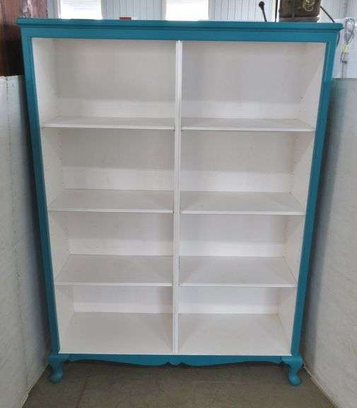Bookshelf, turquoise outside, white inside, has six-shelves, 40"W x 12 ...