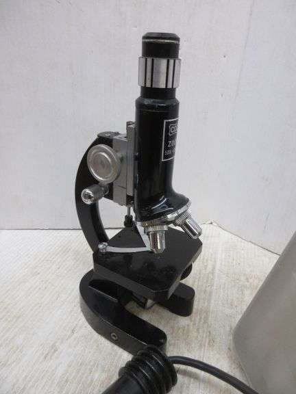 COC zoom microscope with (4) objectives and one eyepiece, light sources ...