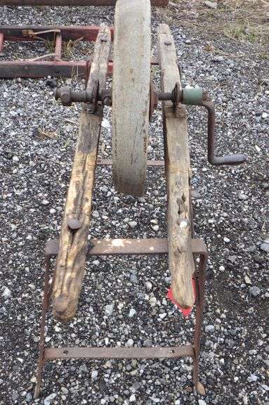 Large sharpening stone on platform - Albrecht Auction Service