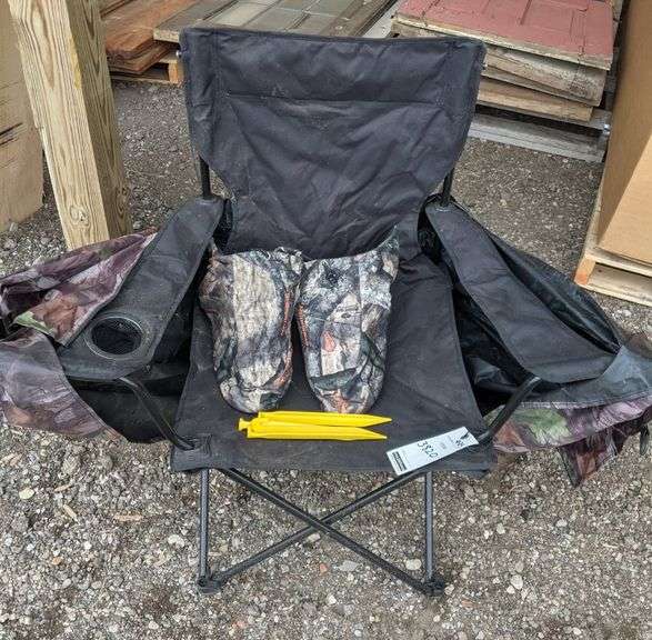 Camo hunting chair with stakes and boots, chair folds up over top ...