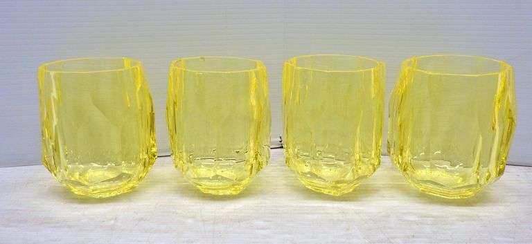 (4) Lucite bright yellow drinking glasses, 4"H - Albrecht Auction Service