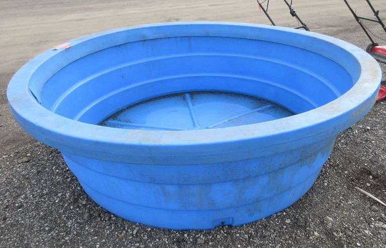 Big blue stock water tank, 92"Dia x 28"H, needs plug - Albrecht Auction ...