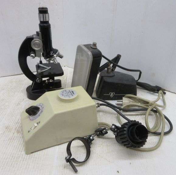 COC zoom microscope with (4) objectives and one eyepiece, light sources ...