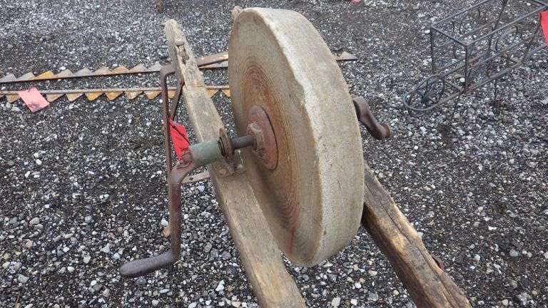 Large sharpening stone on platform - Albrecht Auction Service