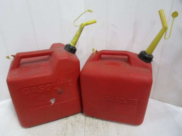 6-Gallon and 5.25-Gallon fuel cans, good - Albrecht Auction Service
