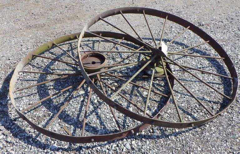 (2) Steel implement wheels, 44" x 2 1/2" - Albrecht Auction Service