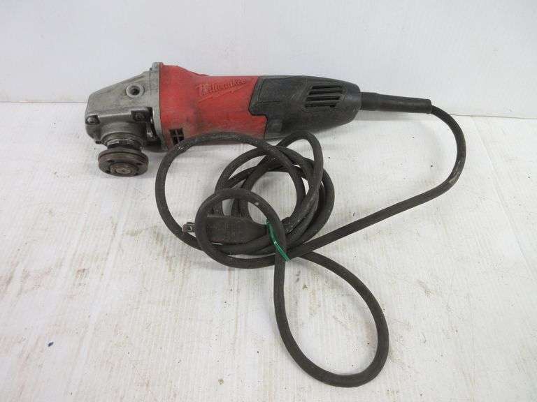 (2) Milwaukee grinders, both work, no guards - Albrecht Auction Service