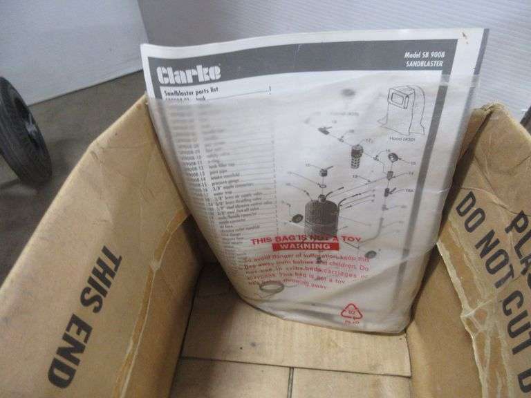 Clarke sandblaster with manual, helmet, face shield, and extra parts ...