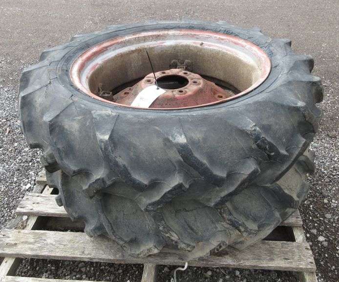 (2) Farmall rear tires, 9.5-24, used - Albrecht Auction Service