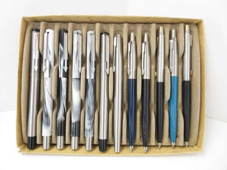(12) Older Parker Pens in a vintage store display, highly collectible ...