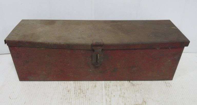 Older Farmall tractor toolbox, inside area are a pair of cub lights ...
