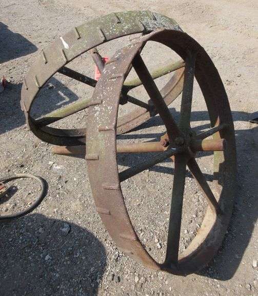 (2) Antique cast iron farm wheels with axles, 32" Wheels - Albrecht ...