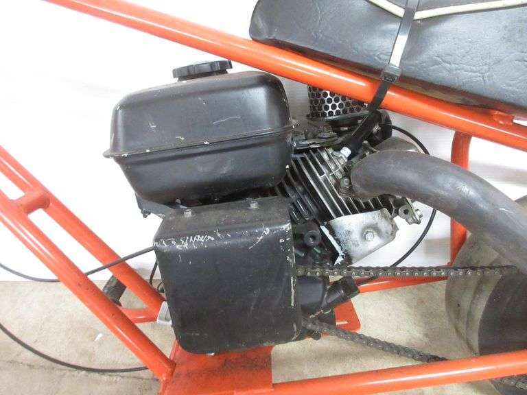 Orange mini bike, needs some TLC, runs - Albrecht Auction Service