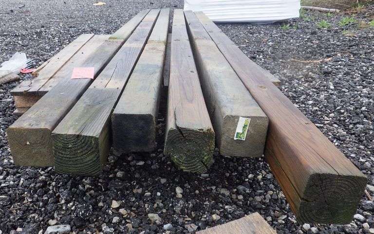 (6) Wood posts, 4"W x 4"D x 9'6"L, used - Albrecht Auction Service