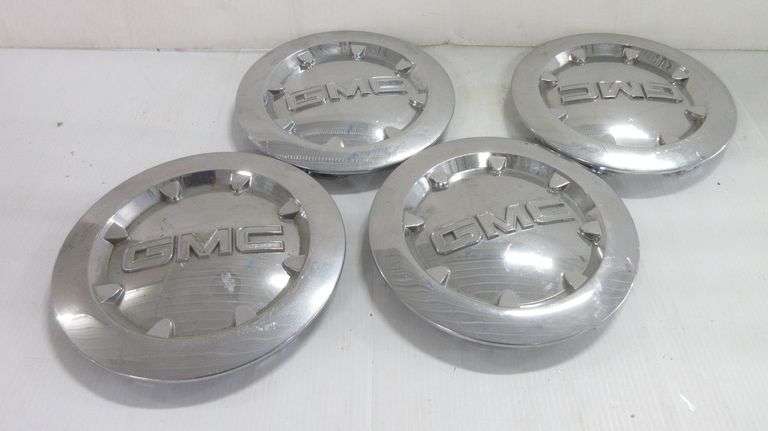 (4) GMC center caps - Albrecht Auction Service