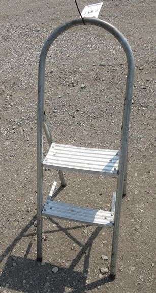 Small metal step stool, 36", some damage - Albrecht Auction Service