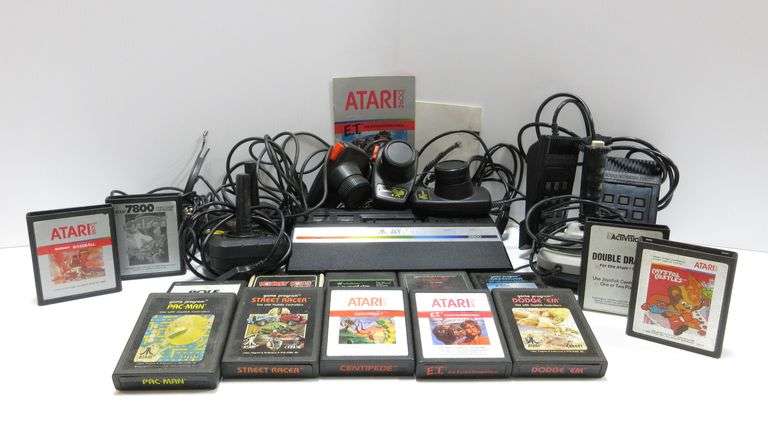 Atari 2600, with (16) games, including E.T. the Game that almost ...