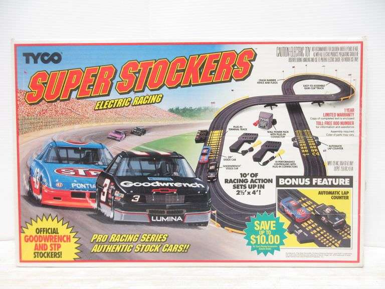 Tyco HO scale slot car set, includes: (2) Cars, transformer ...