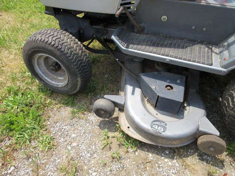 White lawn tractor, 18 HP, 48" mower deck, runs well - Albrecht Auction ...