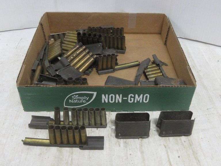 Approx. (24) Gun/military clips with various calibers, some with empty ...
