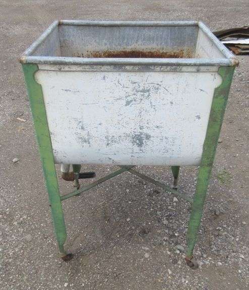 Older "Ideal" single wash tub, in good condition, rusty, gold in color ...