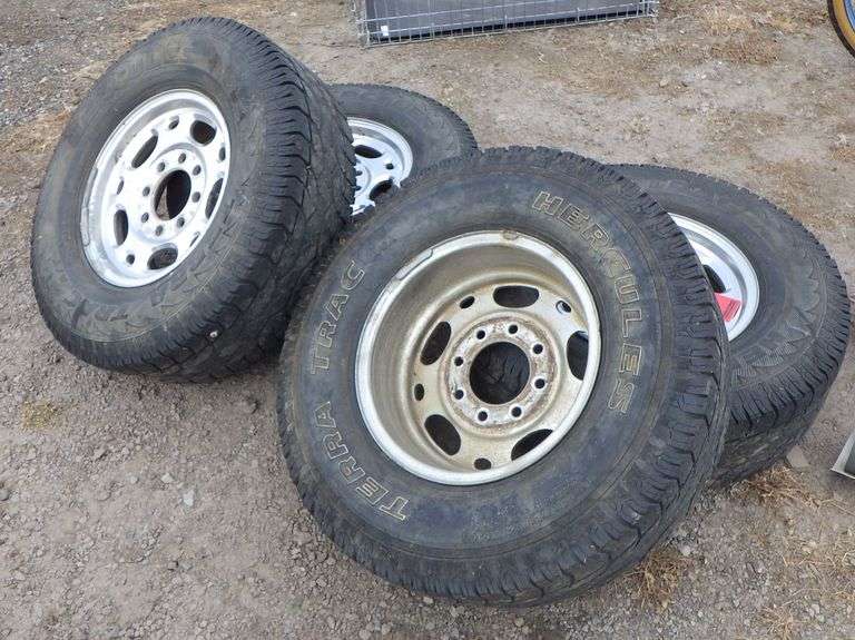 GM 8-Lug aluminum wheels, 8 x 165 x 16, tires worn, corrosion on wheels ...