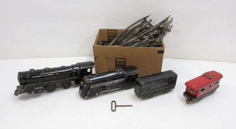 Antique train set, includes: (2) Locomotives, (2) Cars with keys, both ...