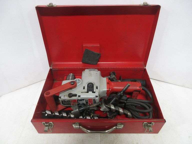 Milwaukee hole hawg No. 1675-1 with steel storage box and assortment of ...