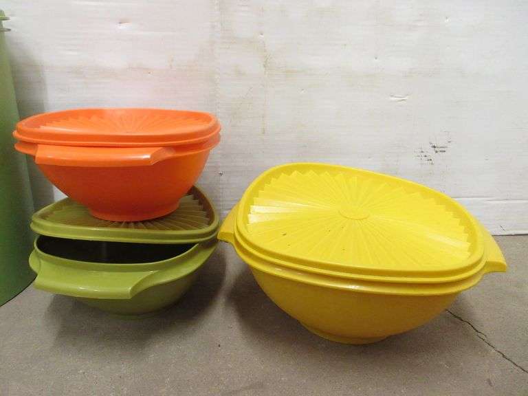 (11) Tupperware dishes, all with starburst lids, all different colors ...