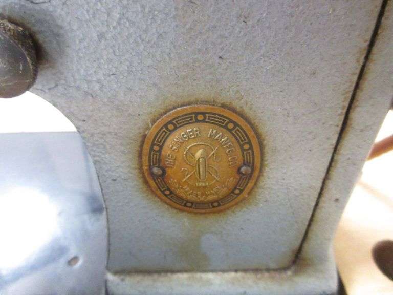 Vintage Singer chainstitch machine with table and bin of string and ...