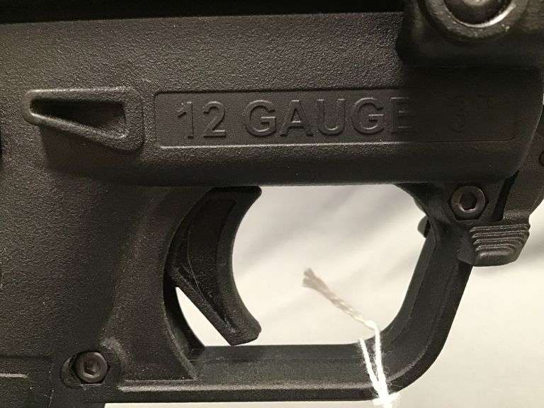Kel-Tec KSG 12-gauge bullpup shotgun, holds 13 shells, Crimson Trace ...