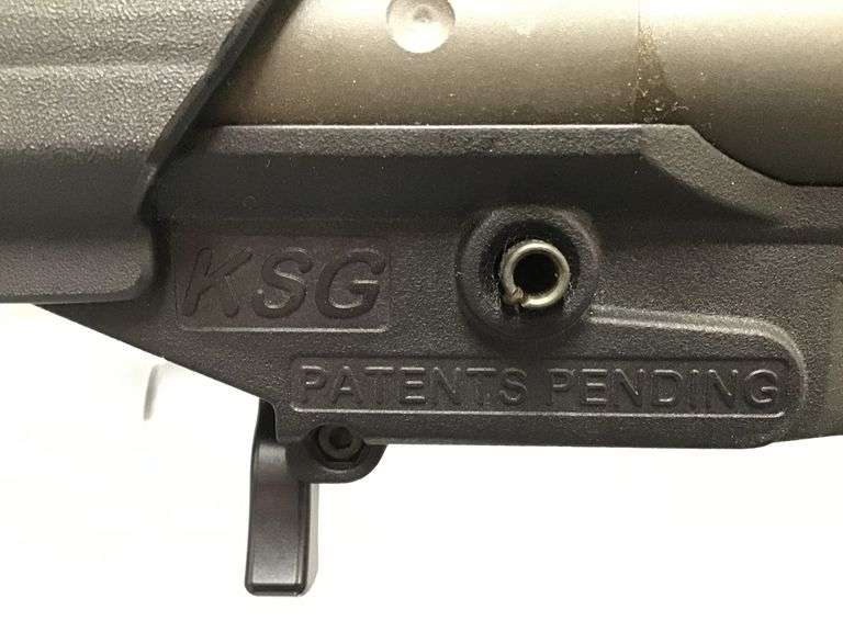 Kel-Tec KSG 12-gauge bullpup shotgun, holds 13 shells, Crimson Trace ...