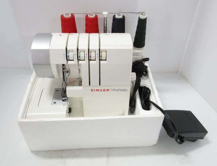 Singer Pro Finish serger/sewing machine, includes (4) cones of thread ...