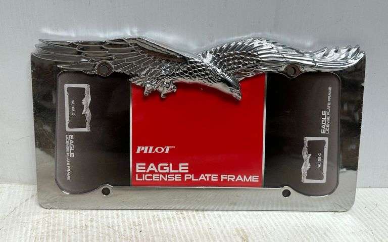 Chrome eagle license plate frame, new - Albrecht Auction Service
