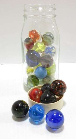 (2) Jars of old marbles, one container has over (100) marbles, other ...