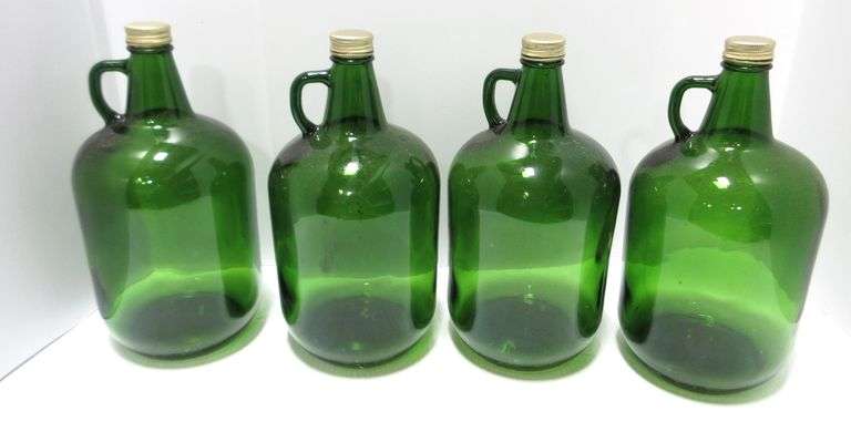 (4) Green glass gallon jugs, very nice condition - Albrecht Auction Service
