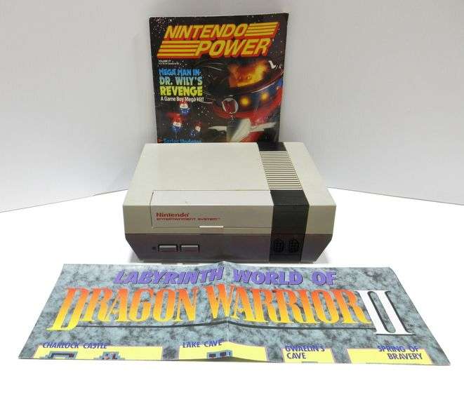 Nintendo Entertainment System (NES) console from 1985, a Nintendo Power ...