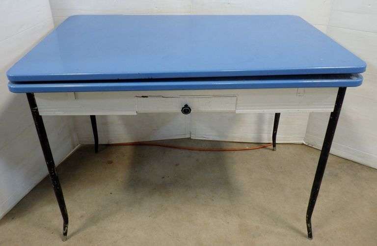 Solid blue enamel table, 40"W x 25"D x 29"H - Albrecht Auction Service