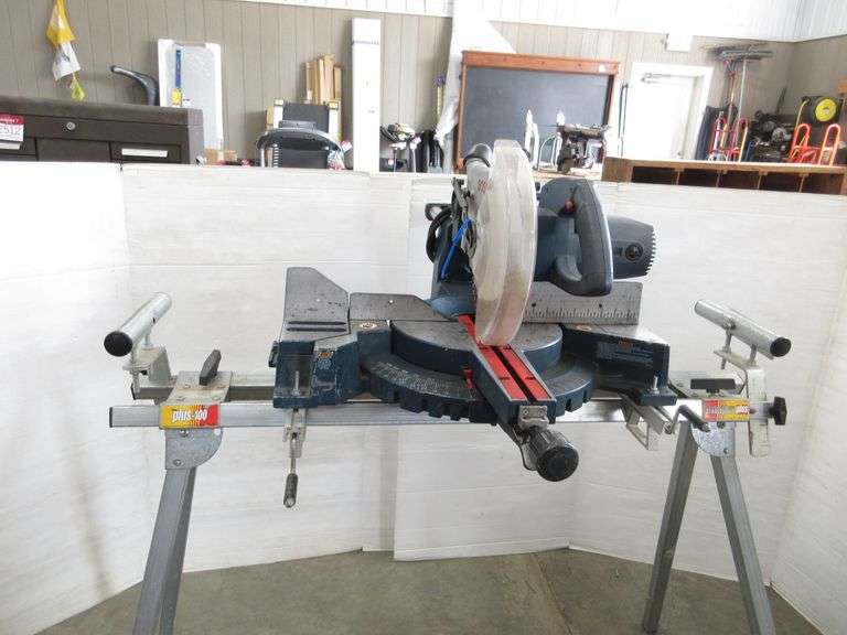 10" Bosch compound sliding miter saw with stablemate, and 100 stand ...
