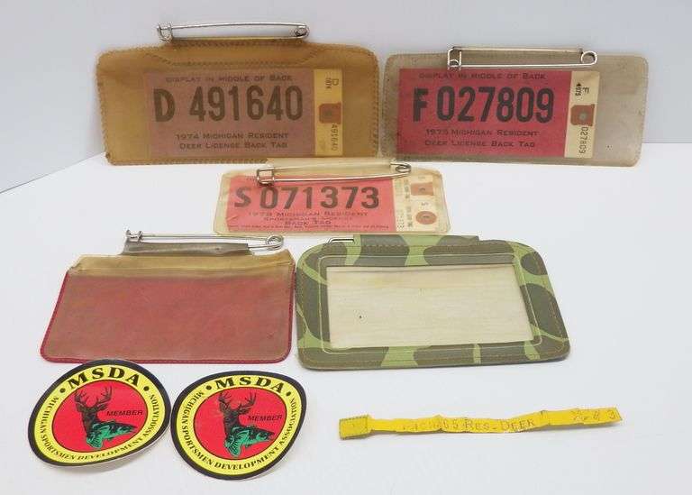 (3) Vintage 1970s Michigan deer hunting licenses with sleeves, (2 ...