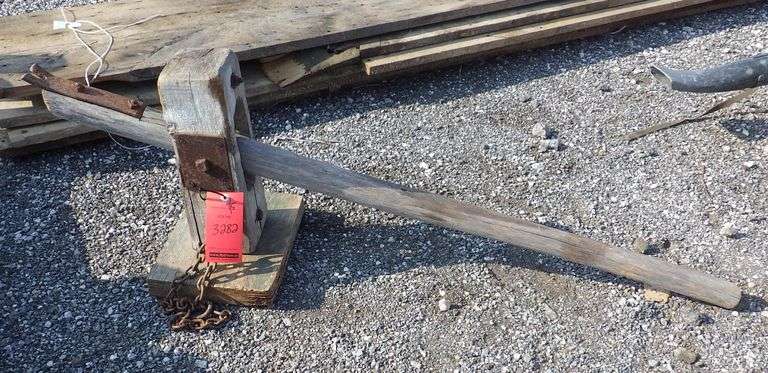 Antique railroad spike puller, mounted on a more modern board, board ...