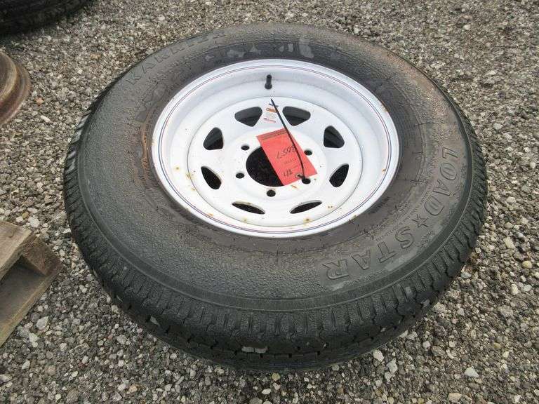 6-Lug Tire and Rim, 225/75 R15, used - Albrecht Auction Service