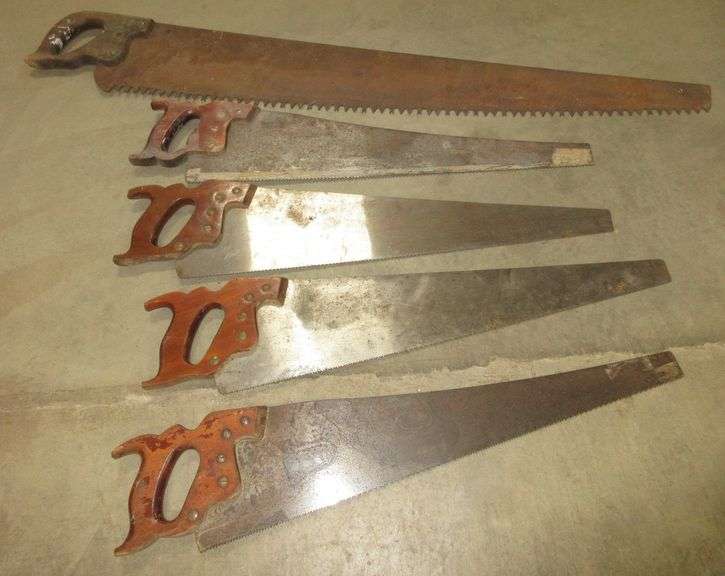 (5) Antique hand saws, one 40" blade, and four 24" blades, in good ...