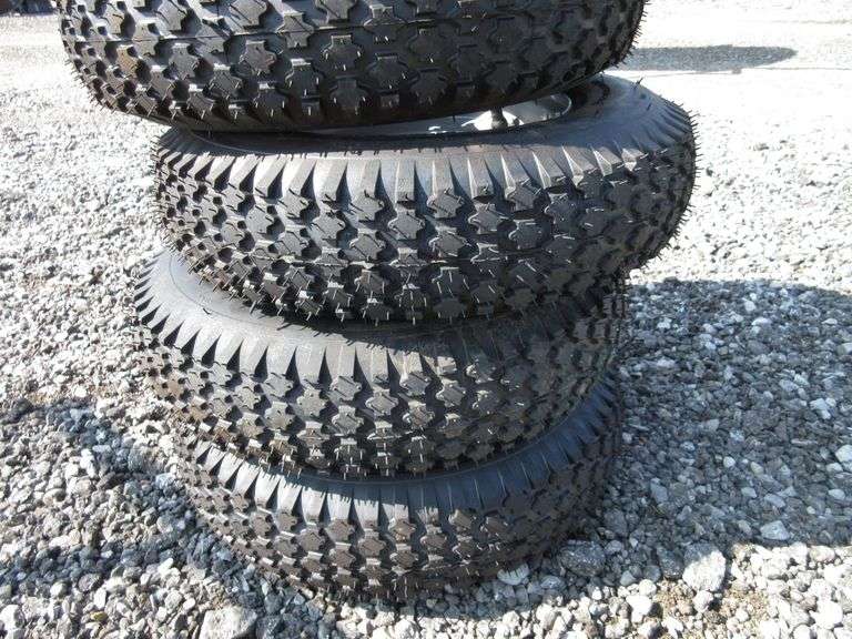 (4) 4-Lug wheels and tires, 4.80 x 4 x 8, new - Albrecht Auction Service