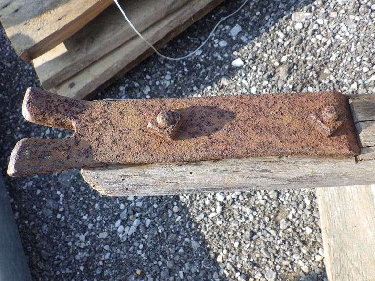 Antique railroad spike puller, mounted on a more modern board, board ...